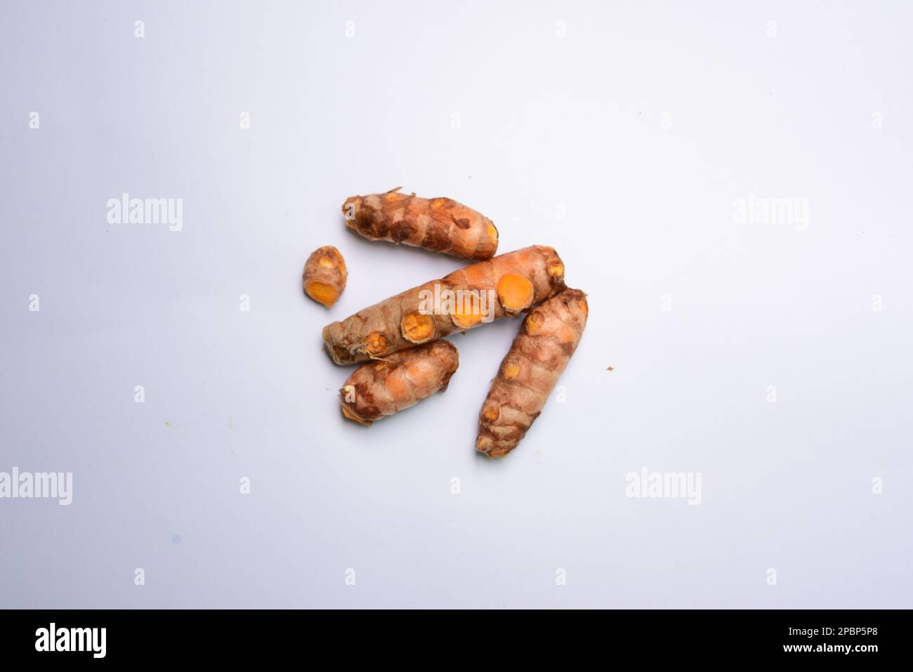 Turmeric on an white background Stock Photo - Alamy