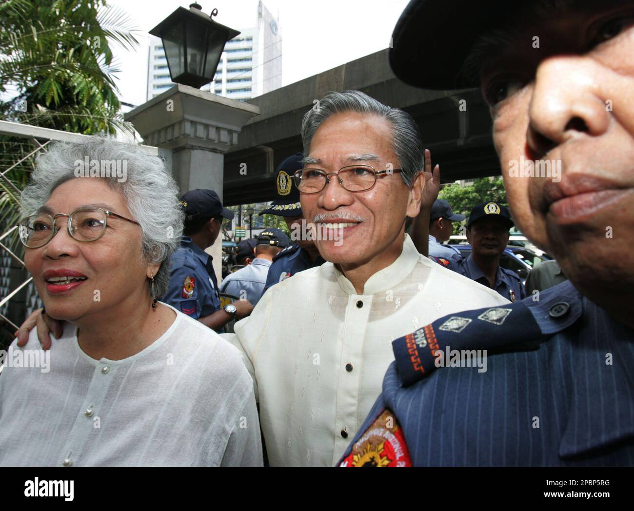 Filipino left-wing Congressman Satur Ocampo, center, arrives at the ...