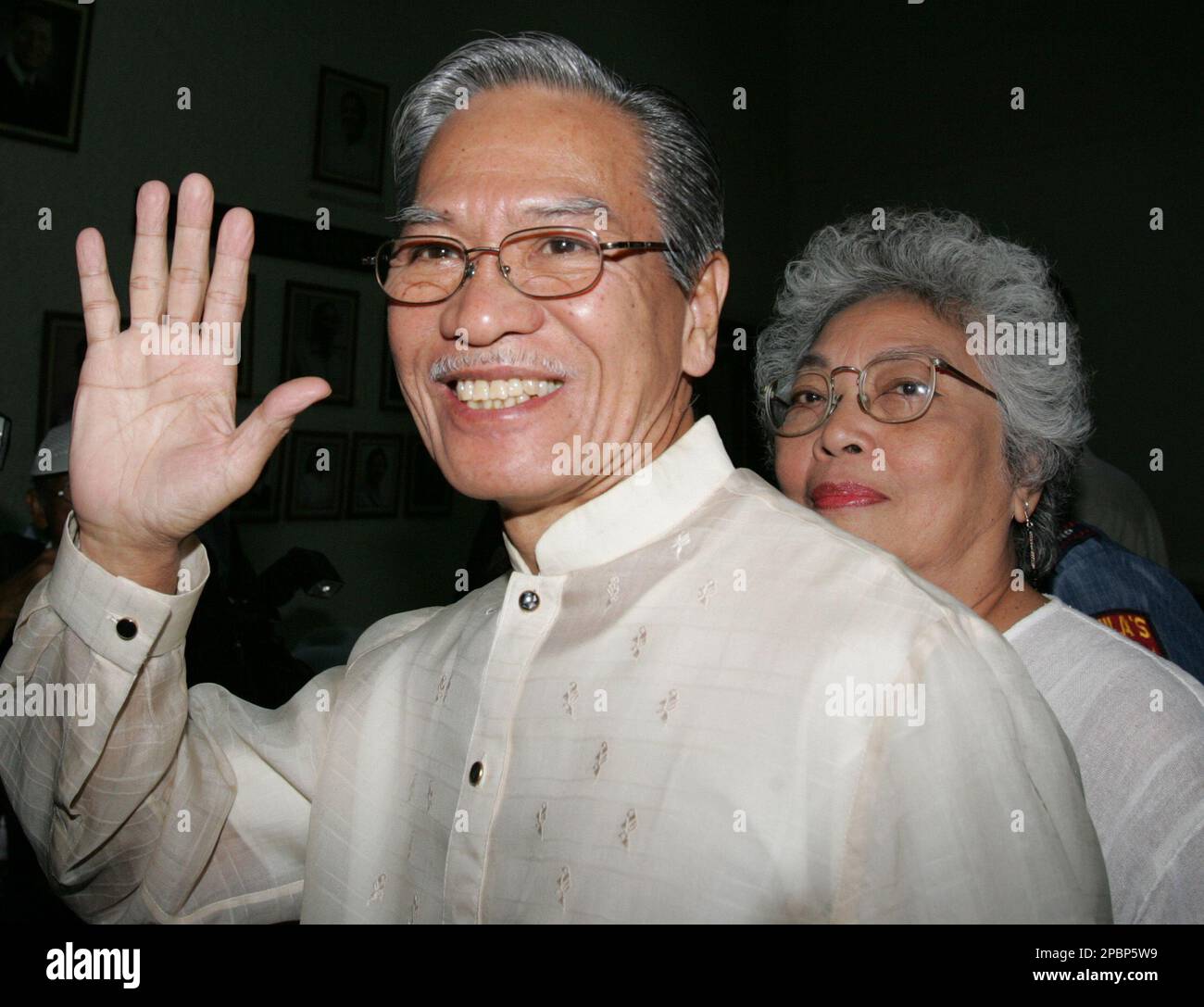 Filipino left-wing Congressman Satur Ocampo waves to photographers as ...