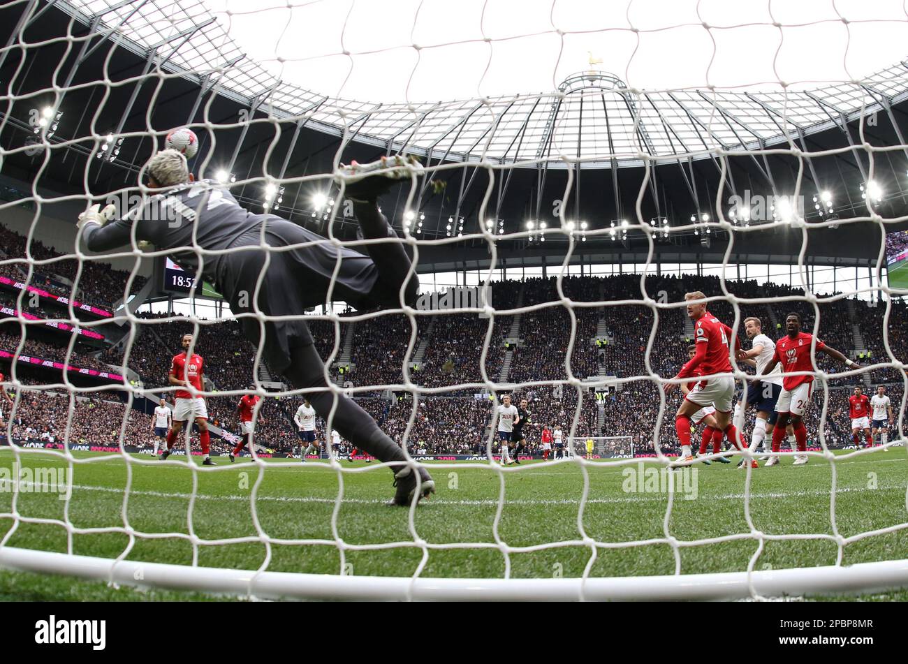 London, UK. 11th Mar, 2023. Harry Kane (TH) scoring the first Spurs ...