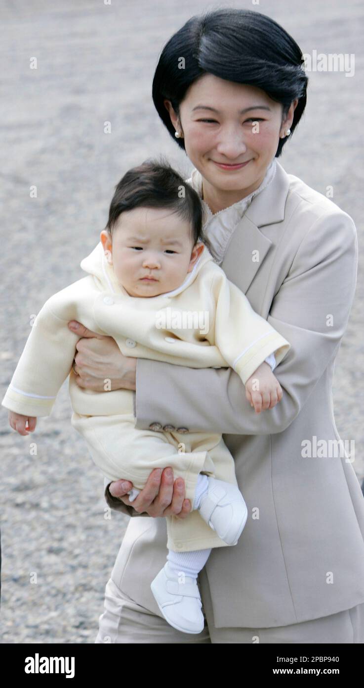 Princess Kiko smiles as she carries Prince Hisahito upon arriving at ...