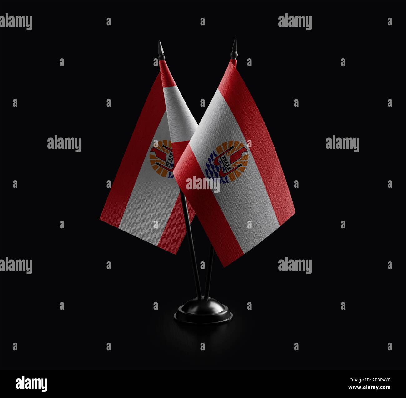 Small national flags of the French Polynesia on a black background ...