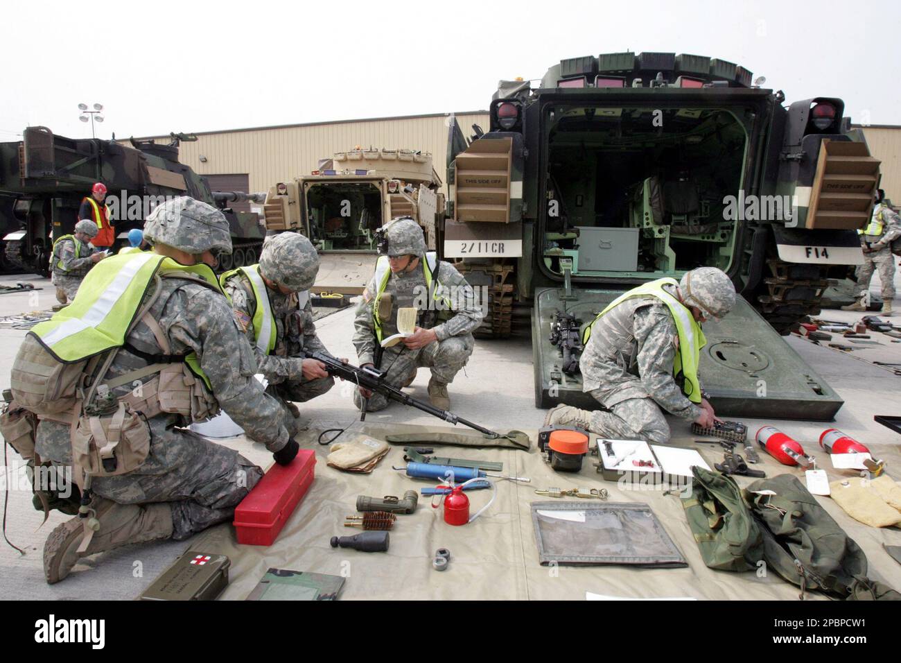 U.S. Army soldiers check their gear during joint exercises with South ...