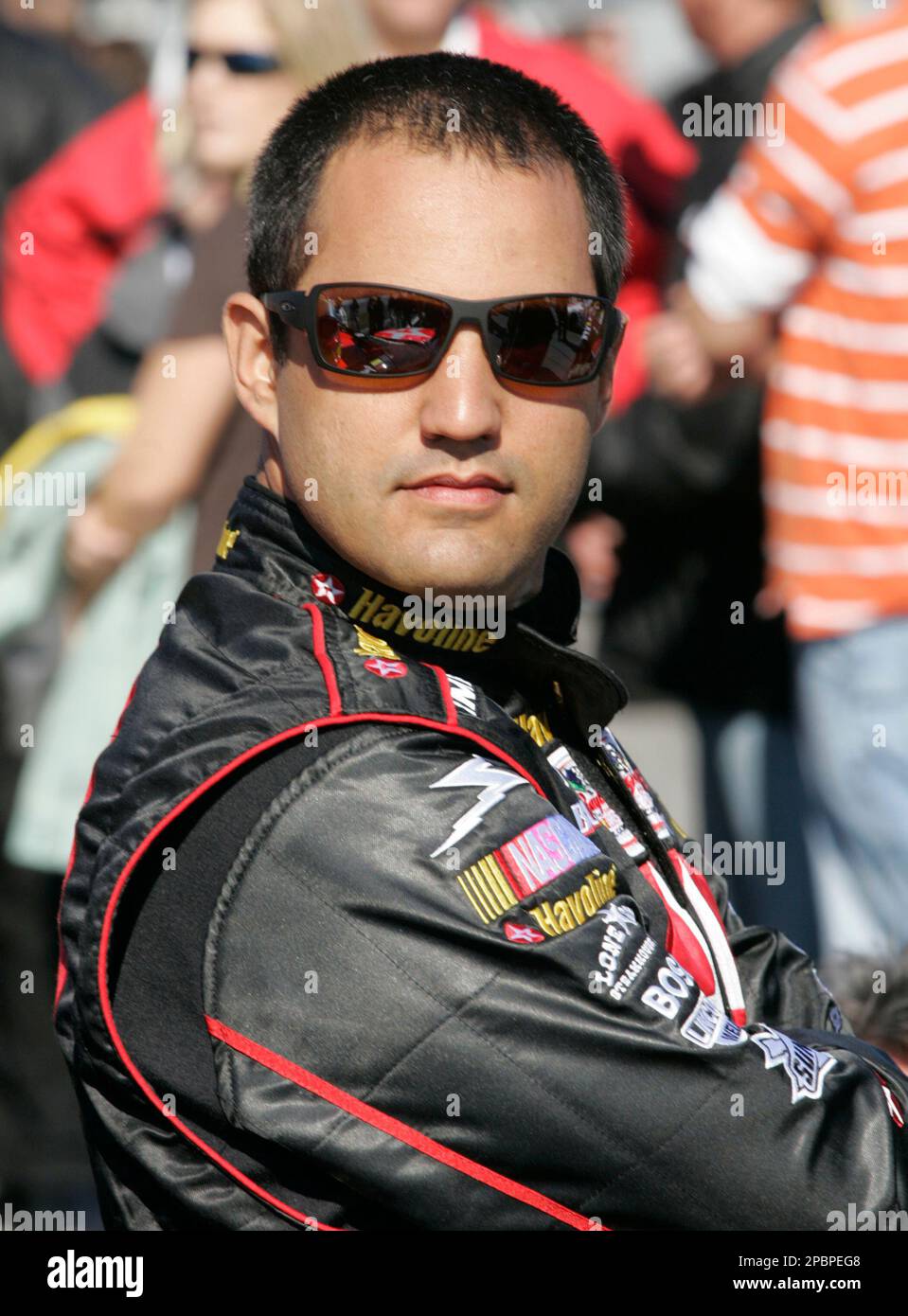 ** FILE ** Juan Pablo Montoya walks down pit road prior to the start of ...