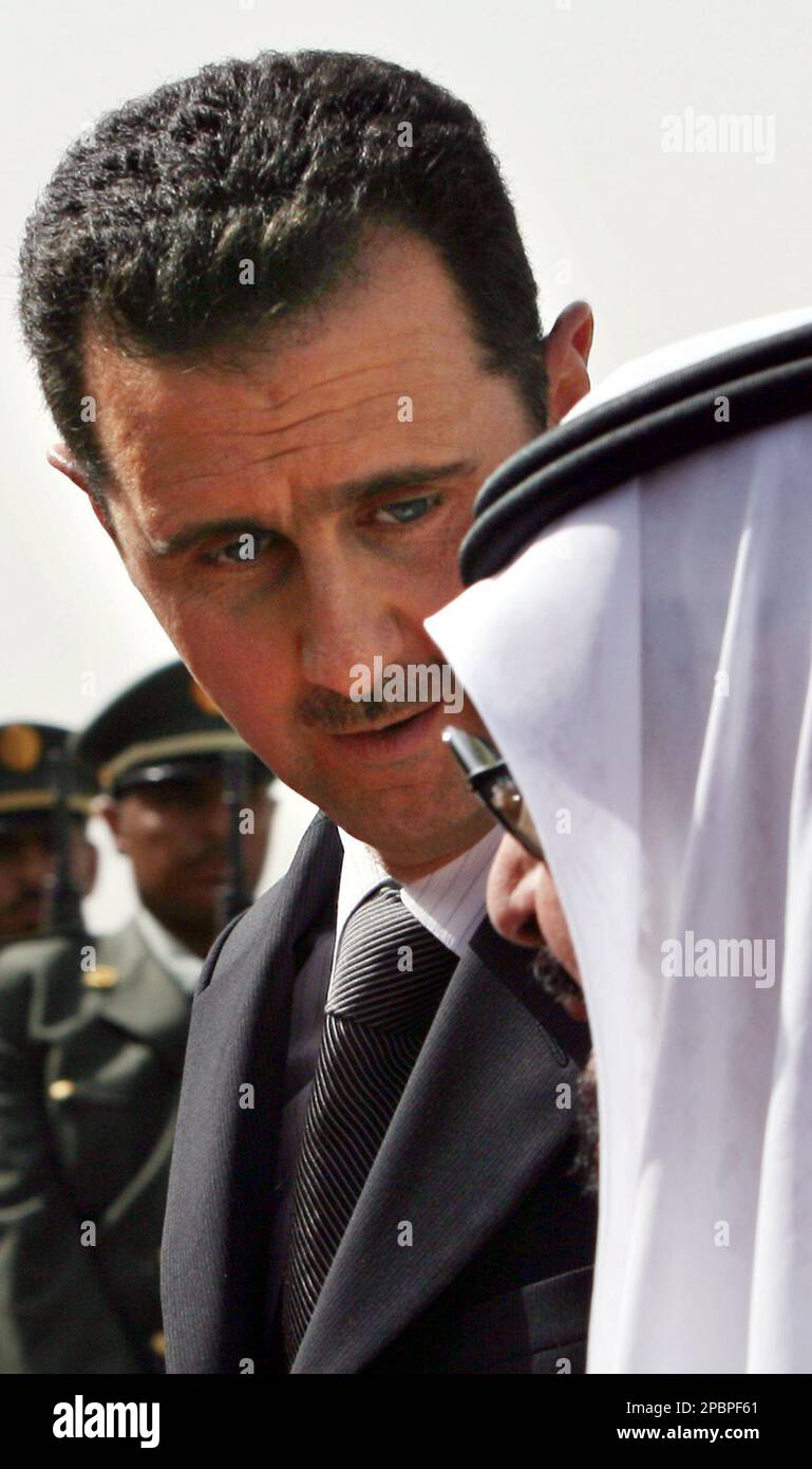 King Abdullah bin Abdul Aziz al-Saud of Saudi Arabia, right talks with ...