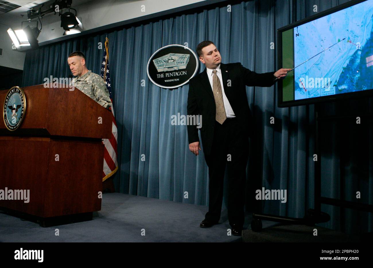 Army Criminal Investigation Division Special Agent Scott Godwin, right ...