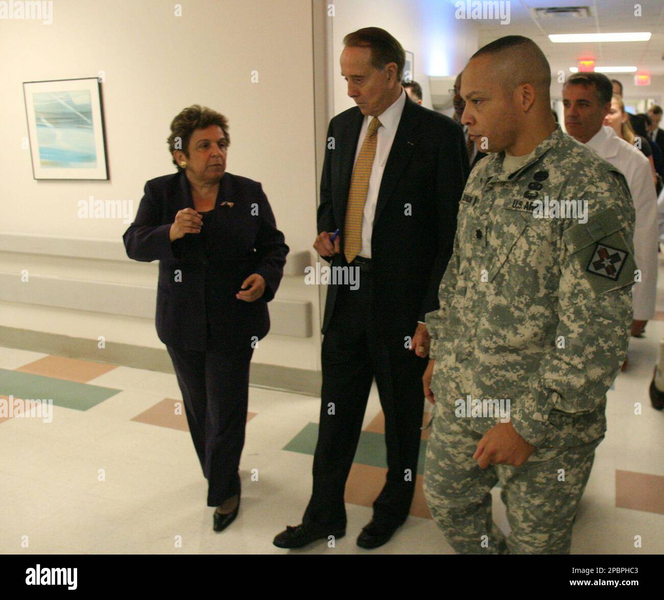 Former Sen. Bob Dole, center, co-chair for the Commission on Care for ...