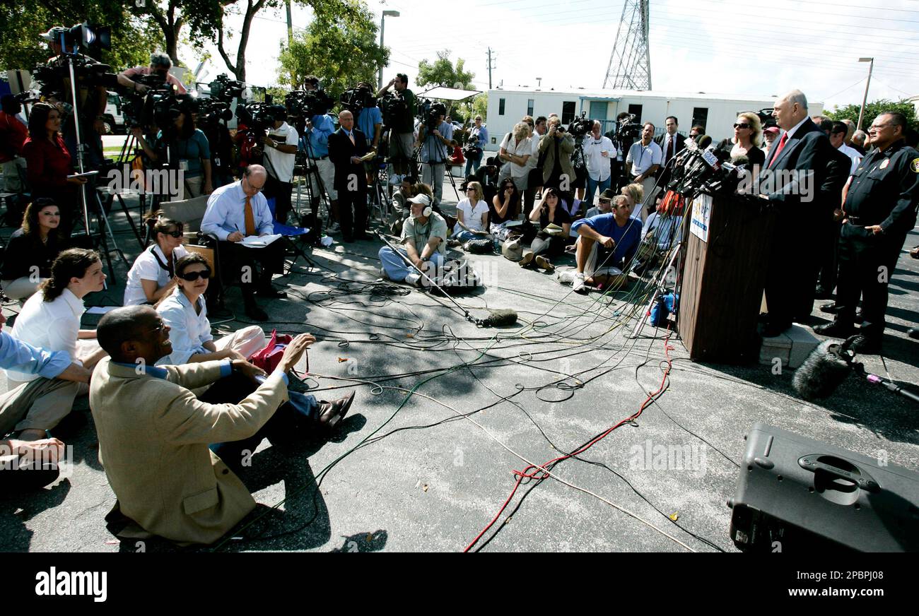 Dr. Joshua Perper, at podium right, discusses the death of Anna Nicole ...