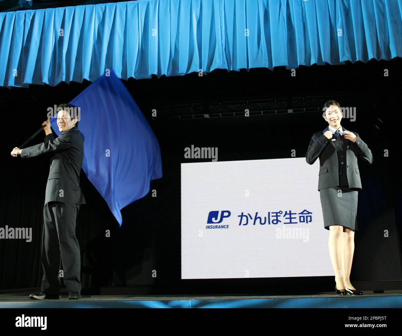 Models wearing new uniforms of Japan Post Insurance, pose with a new ...