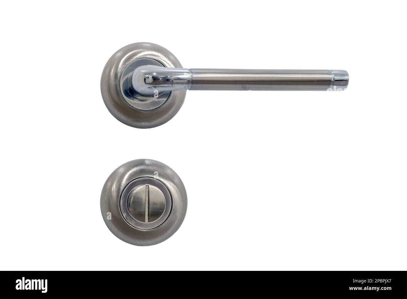 Metal handle with a rotary lock on a white half-open door, close-up ...