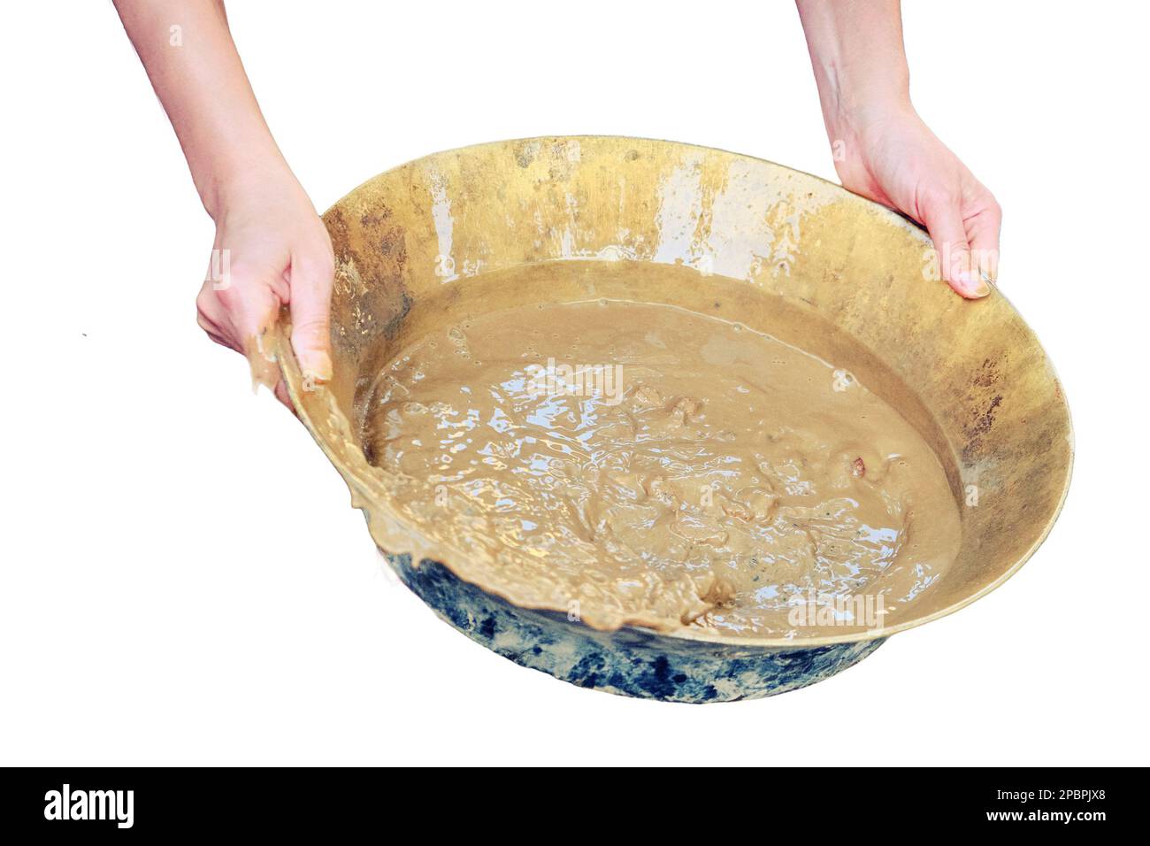 Women's hands with a tray for the extraction of gold sand in US ...