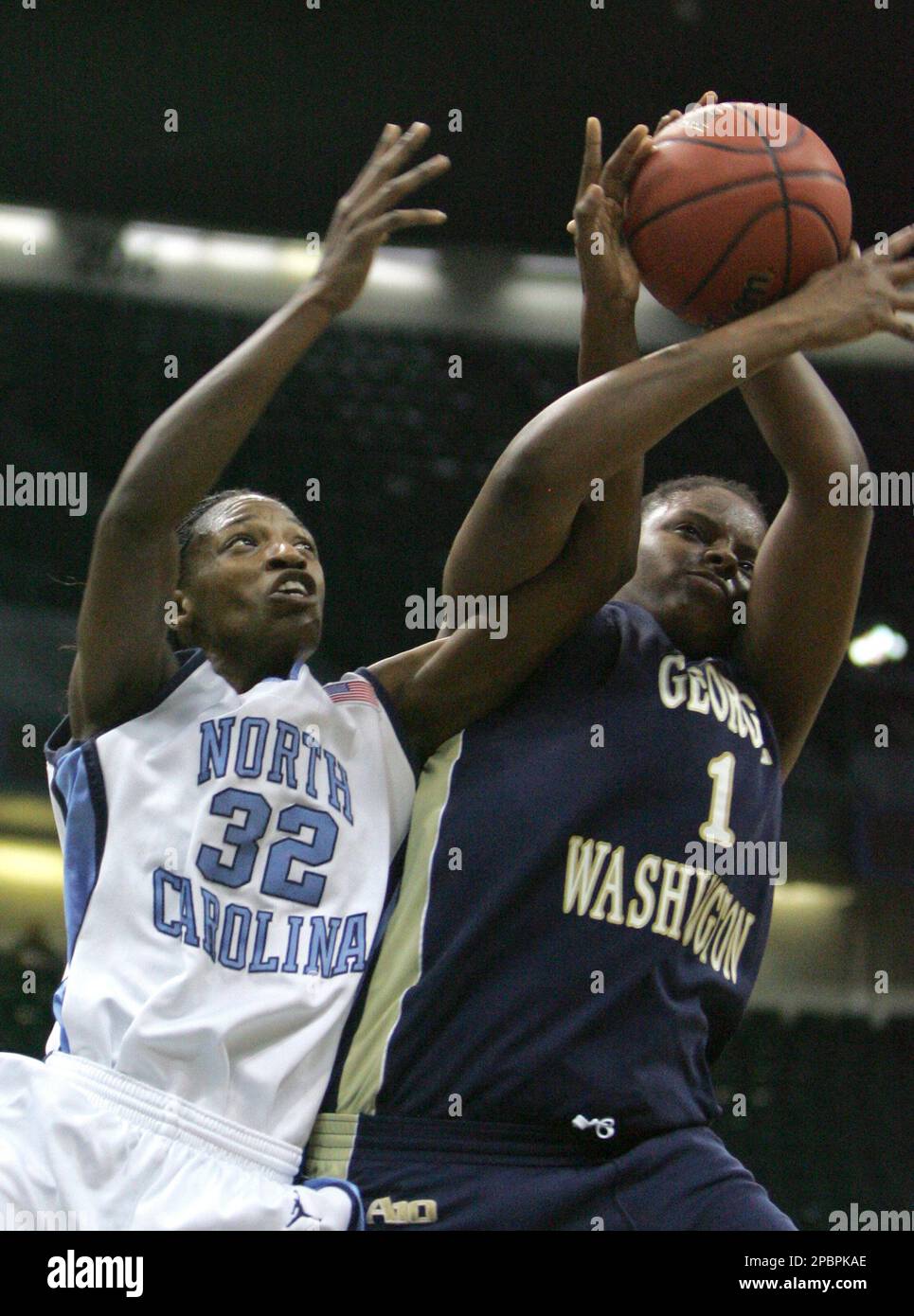 North Carolina forward Rashanda McCants (32) and George Washington ...
