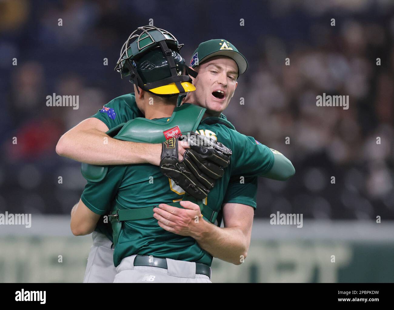 Australia's closer Jon Kennedy and pitcher Robbie Perkins reacts after ...