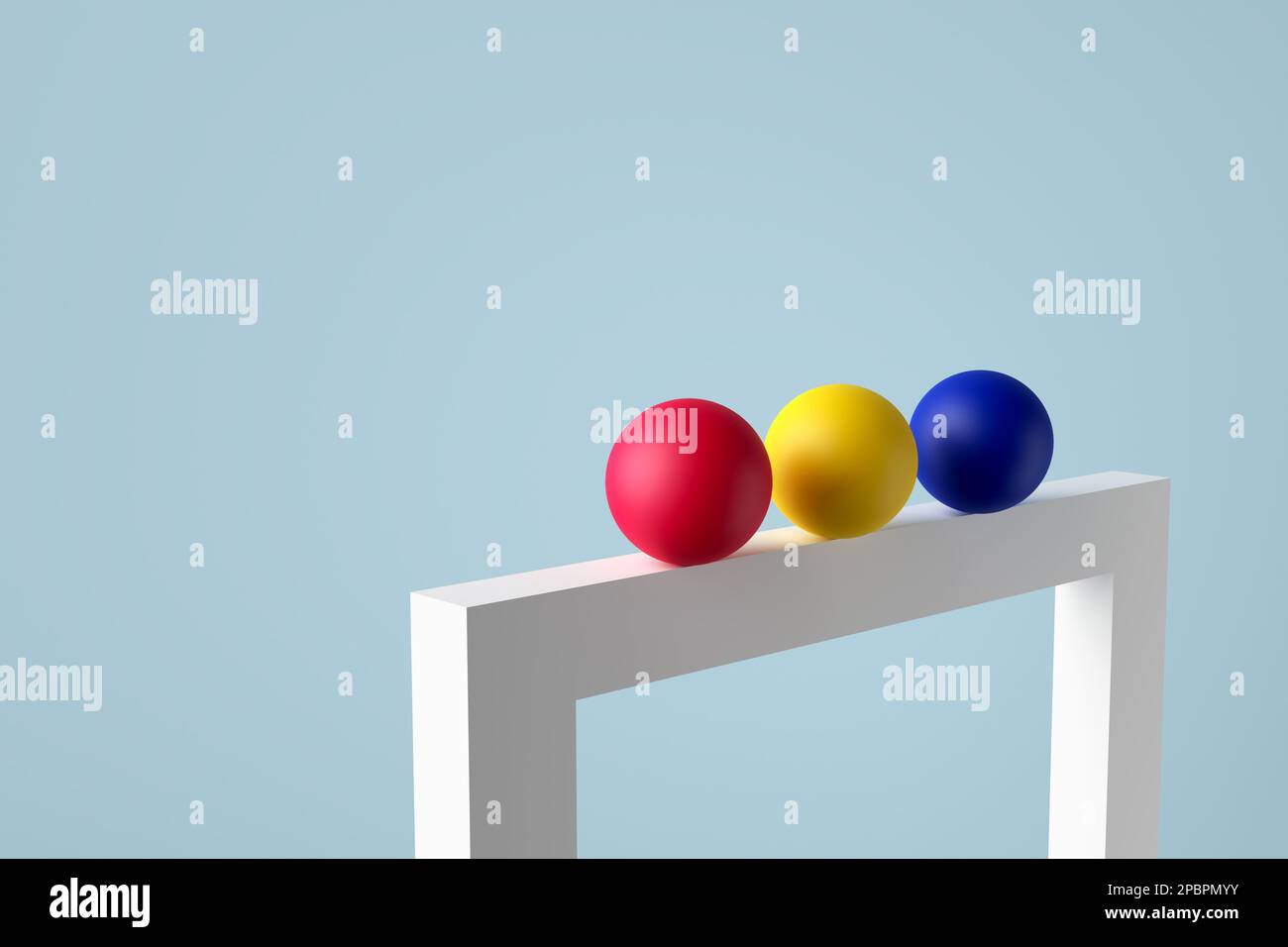 Colored spheres in a row balancing on an empty frame. Abstract ...