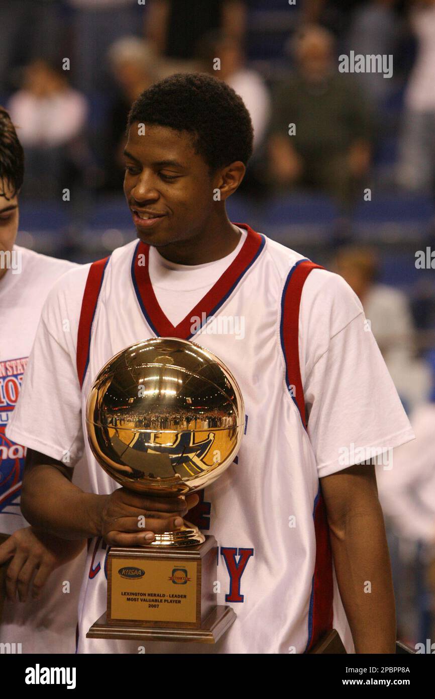 Scott County's Bud Mackey celebrates with teammates after being named ...