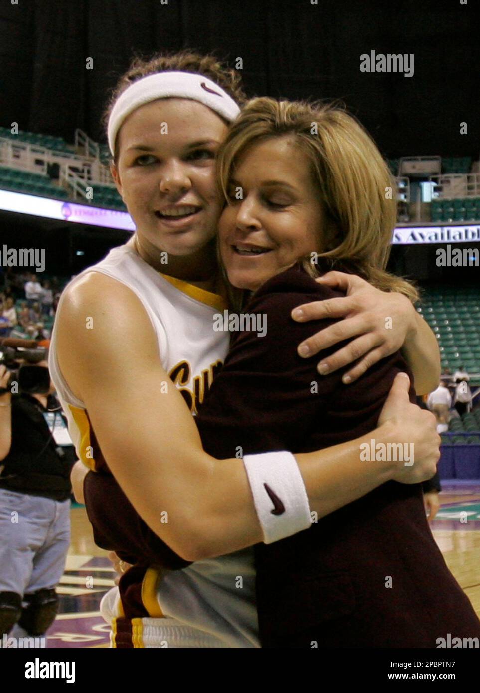 Arizona State coach Charli Turner Thorne, right, embraces Danielle ...