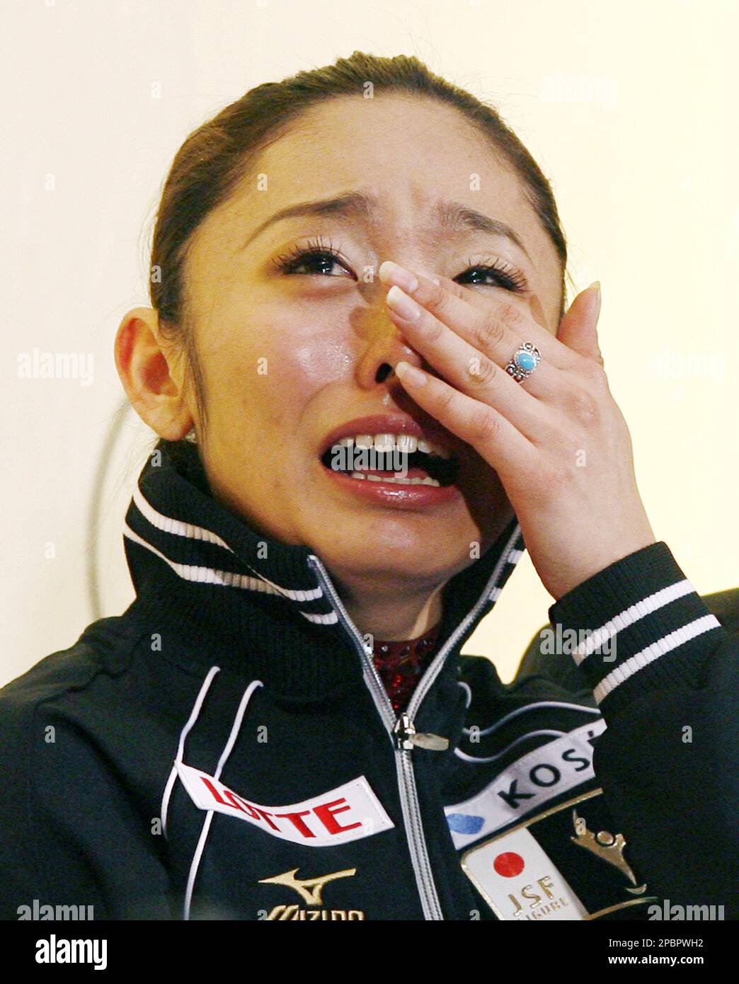 Miki Ando of Japan cries upon learning she scored the highest mark to ...