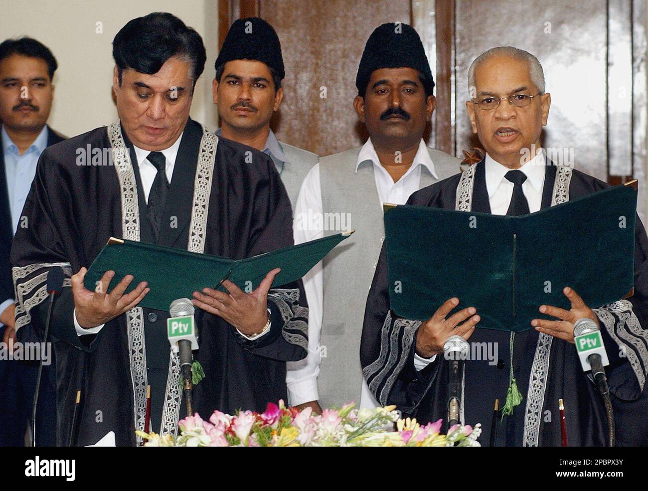 Senior judge of Pakistans Supreme Court Justice Javed Iqbal, left ...