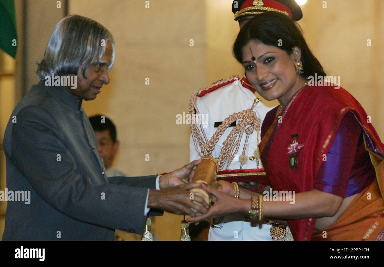 Indian classical Bharatnatyam dancer Geeta Chandran, right, receives ...