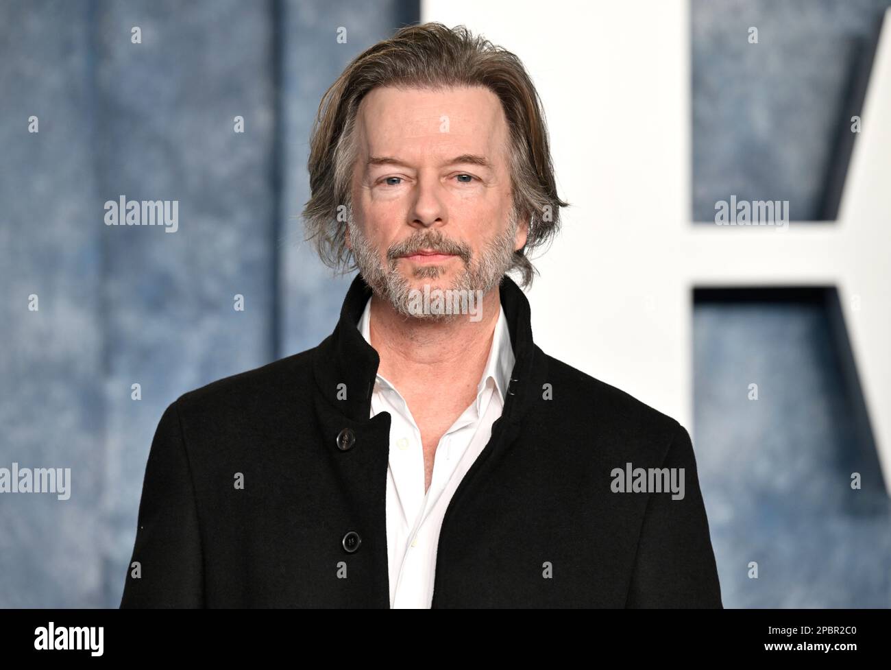 David Spade arrives at the Vanity Fair Oscar Party on Sunday, March 12 ...