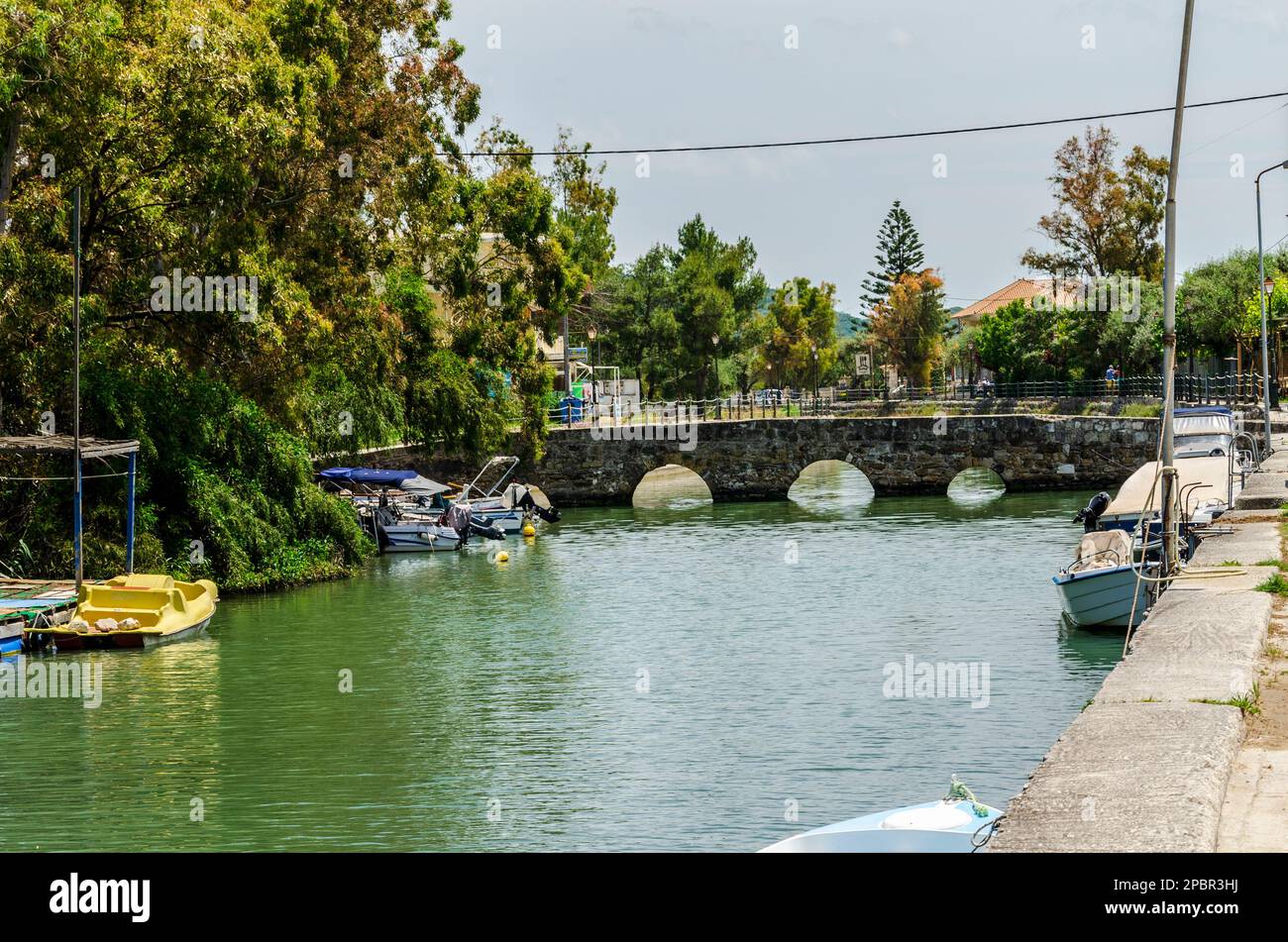 Bridge over a river leading into the mediterranean, Alykes, Zakynthos ...