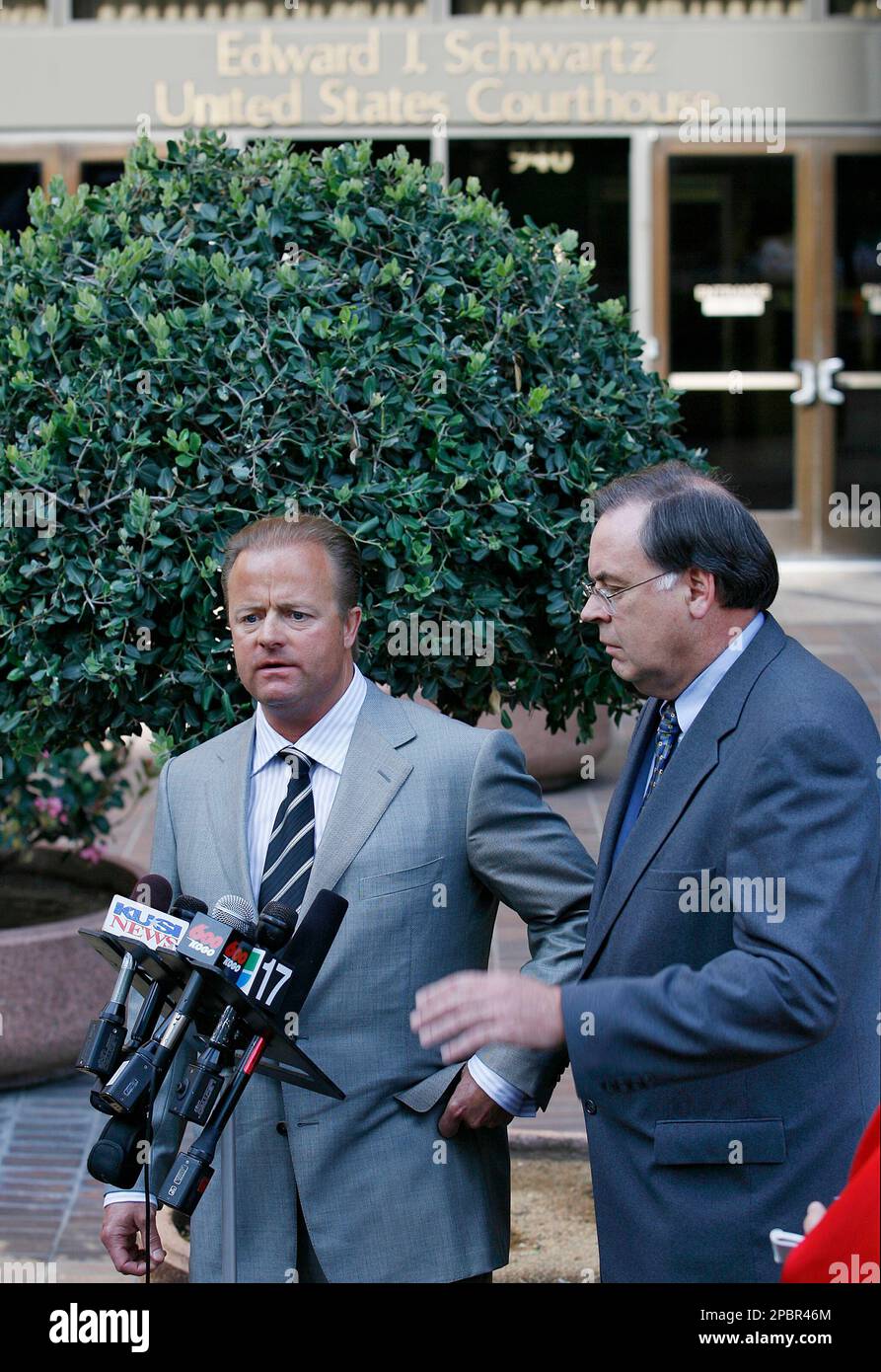 Michael Galardi, left, of Las Vegas, speaks with reporters after his ...