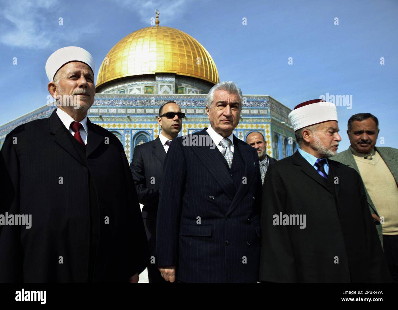 Turkish Ambassador to Israel Ercan Ozer, center, and members of a ...
