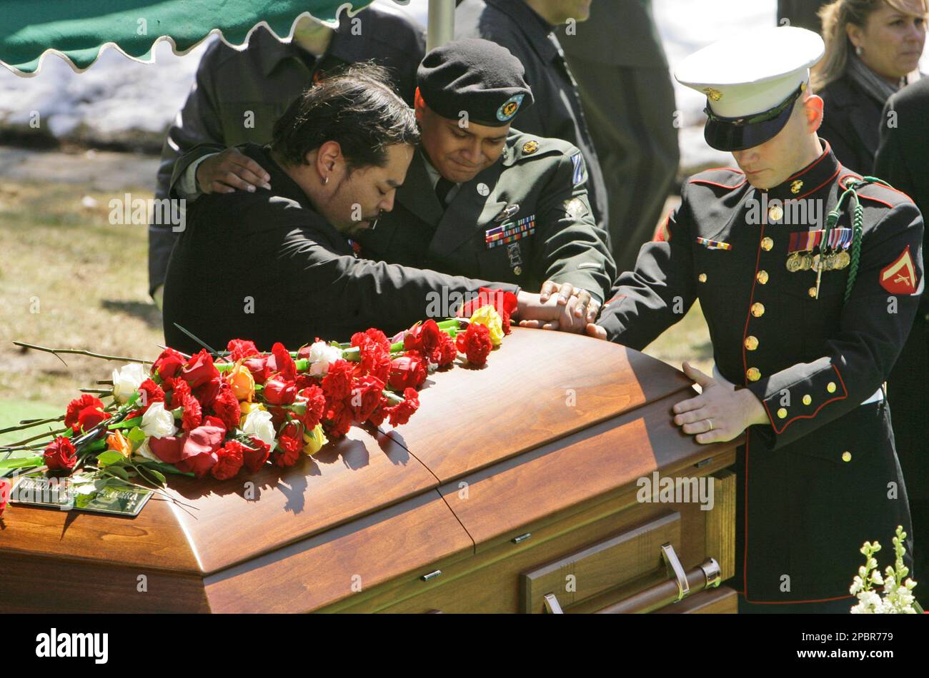 Army Spc. Michael D. Rivera's brother Lance Cpl. Alfredo Rivera, right ...