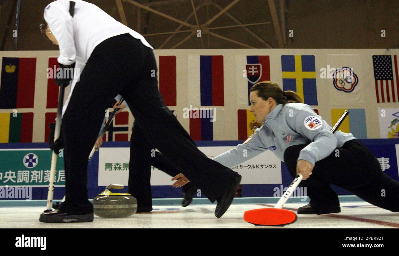United State's skip Debbie McCormick release a stone to teammates ...