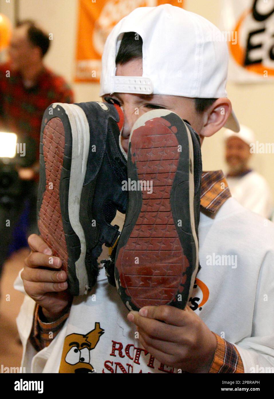 Kyle Underwood, 9, of Las Cruces, N.M., checks his sneakers for smell ...