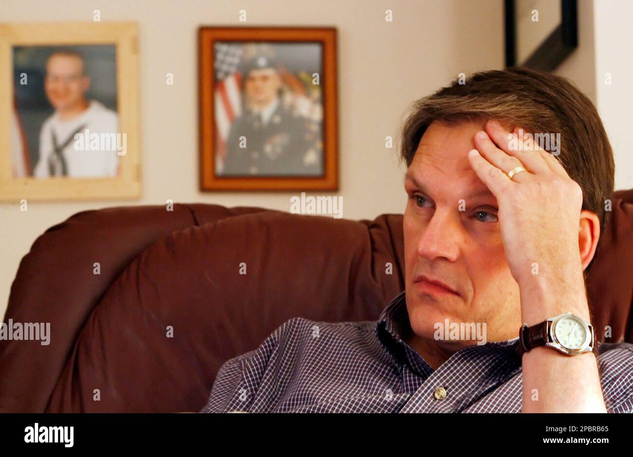 Larry Syverson listens at his Chesterfield, Va., home Jan. 10, 2007 ...
