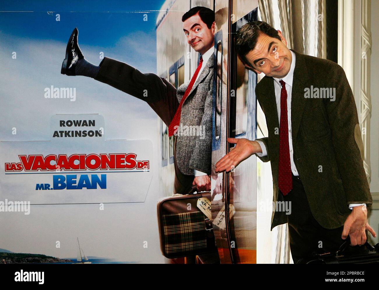 British actor Rowan Atkinson playing the part of character 'Mr Bean ...