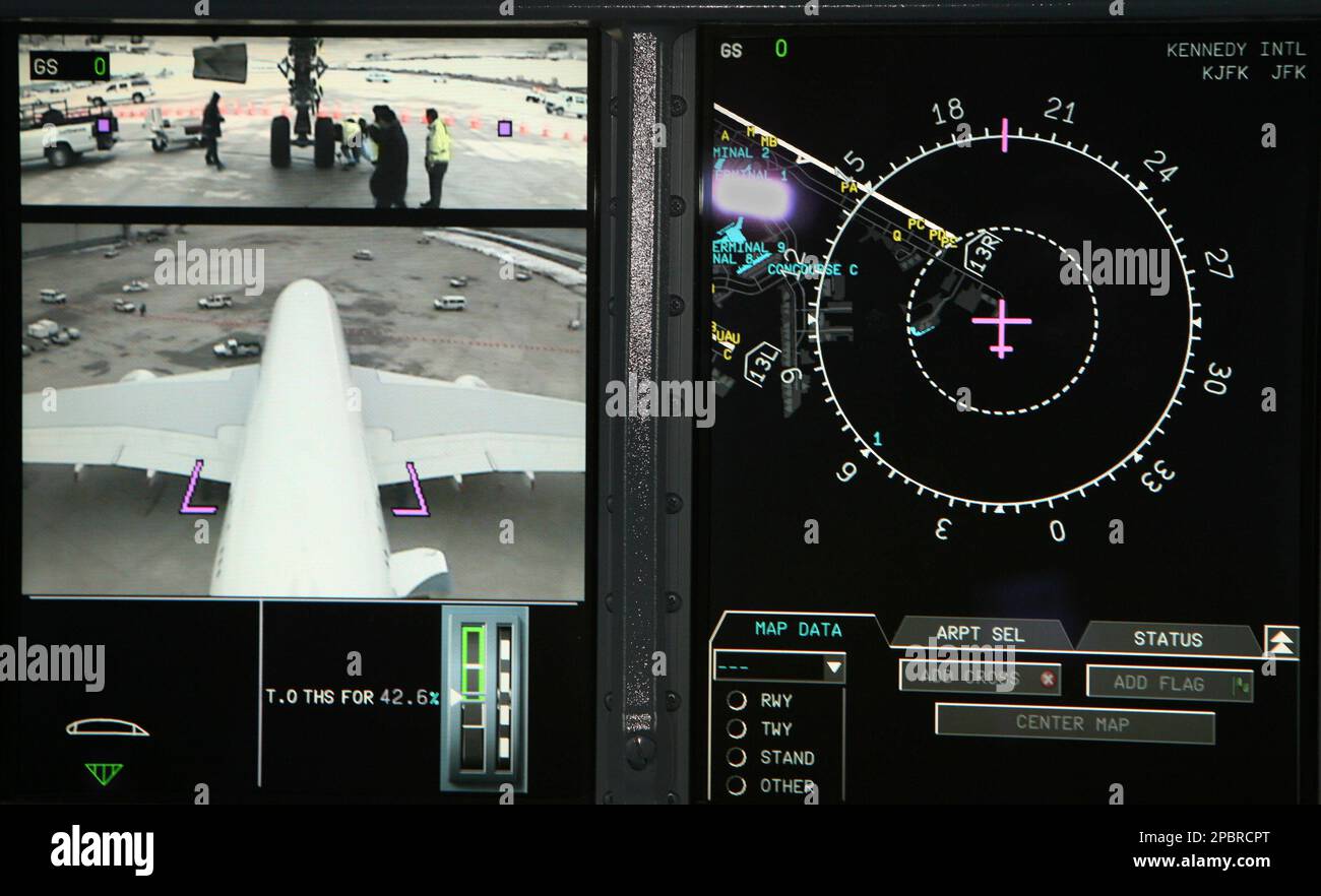 Video screens and a radar screen are shown in the cockpit ...