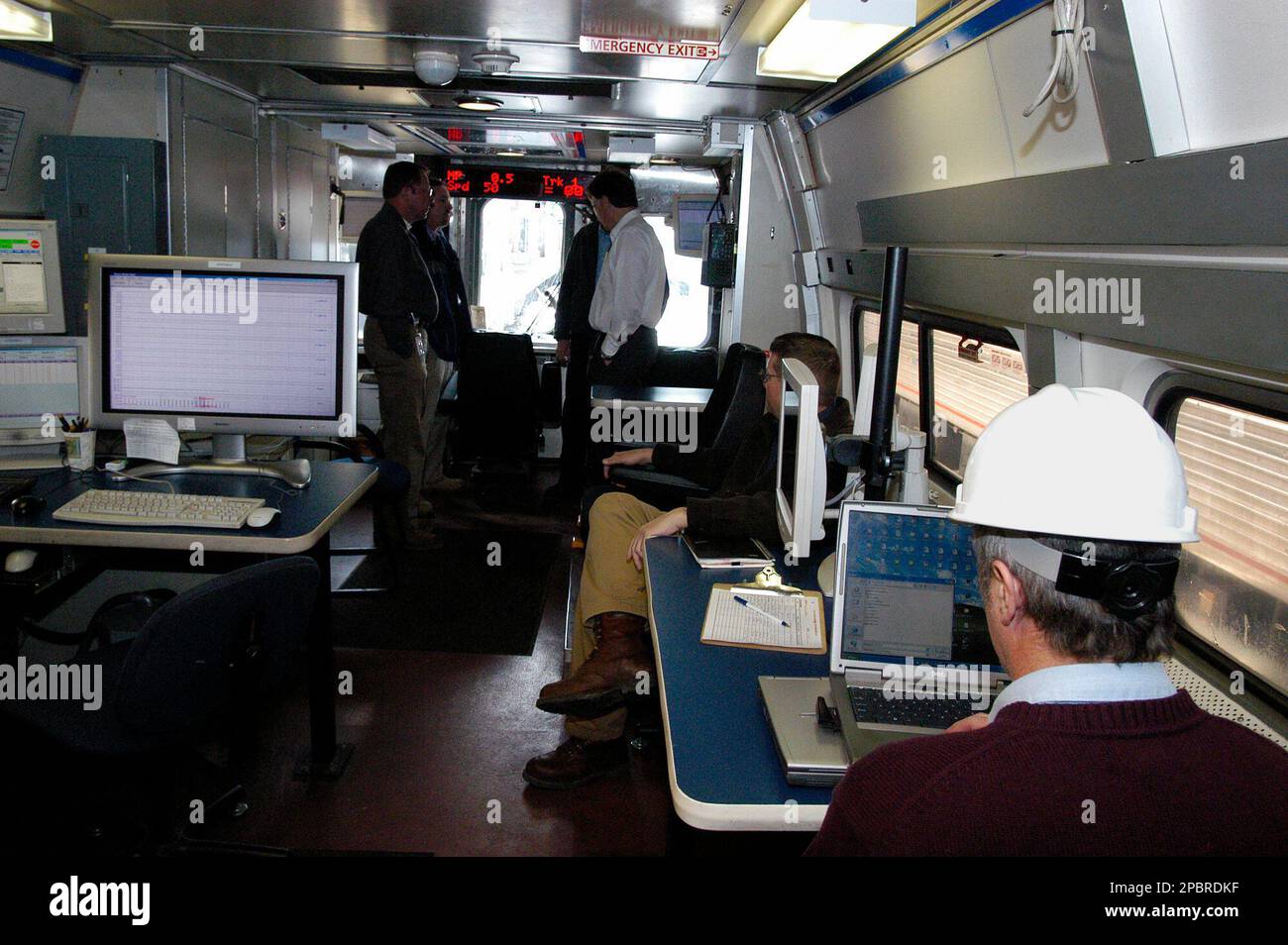 Engineers monitor data inside a rail inspection vehicle in Rensselaer ...