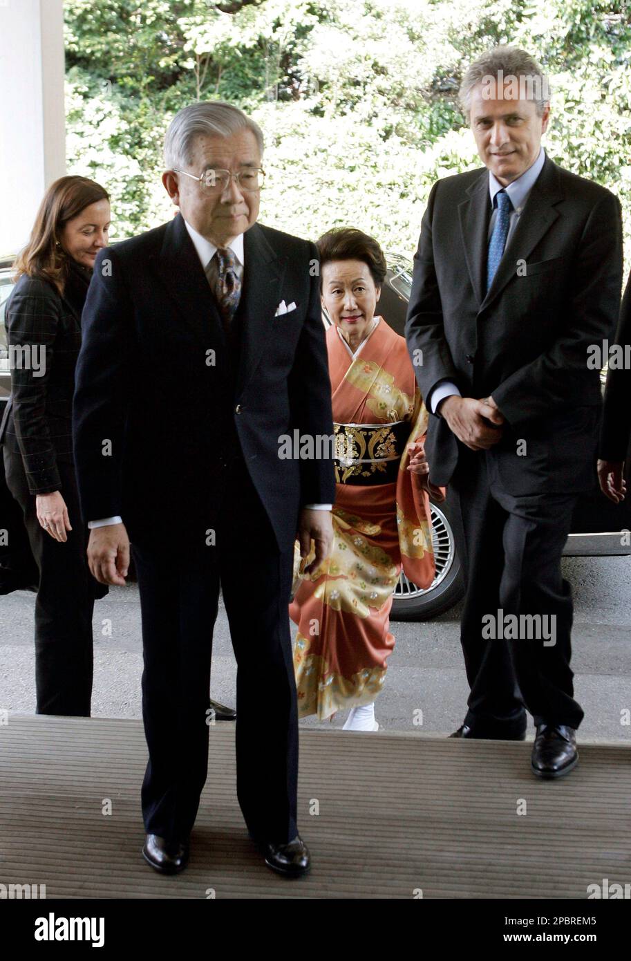 Japan's Prince Hitachi, second from left, and his wife Princess Hanako ...