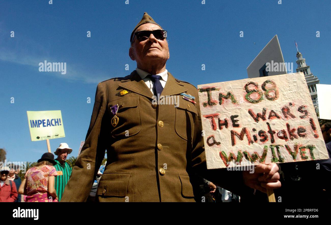 Wearing his original uniform and a Purple Heart medal, Harold Unsicker ...