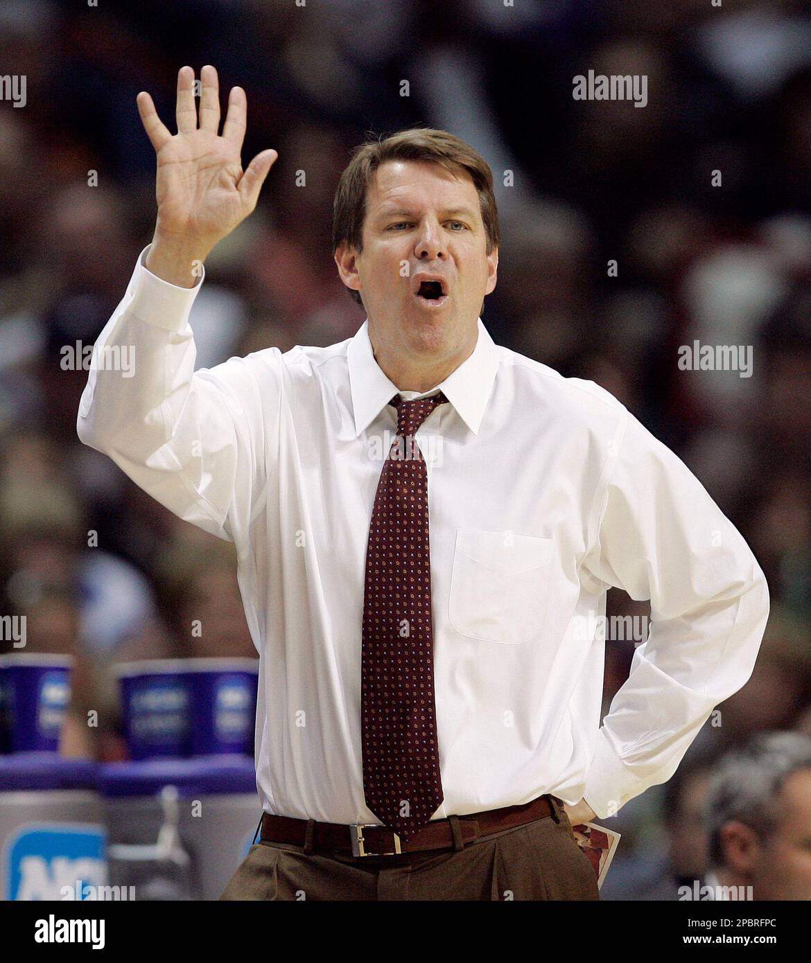 Southern California coach Tim Floyd motions to the floor against Texas ...