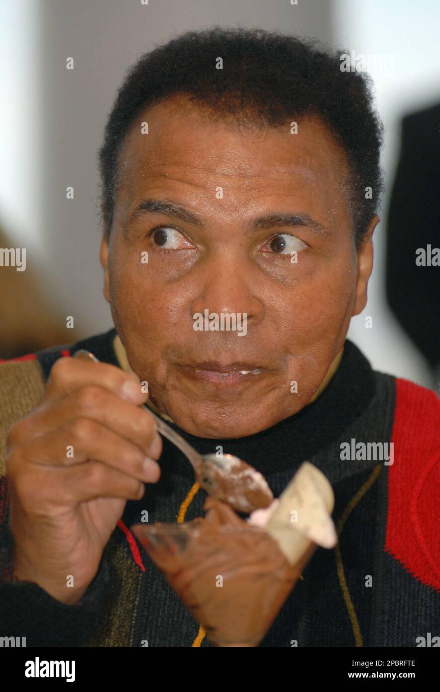 Muhammad Ali enjoys dessert after being wished a happy birthday, Sunday ...