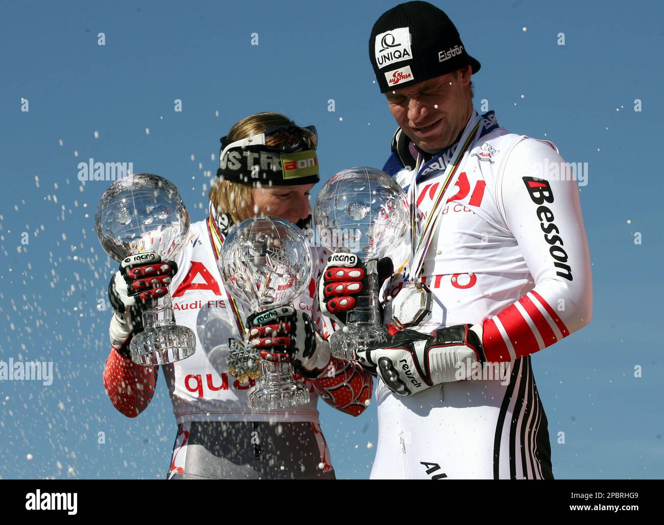 Benjamin Raich, of Austria, right, and Marlies Schild, of Austria, show ...