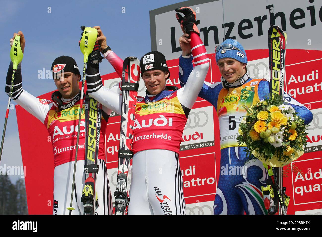 Benjamin Raich, of Austria, center, winner of an Alpine Ski, Men's ...