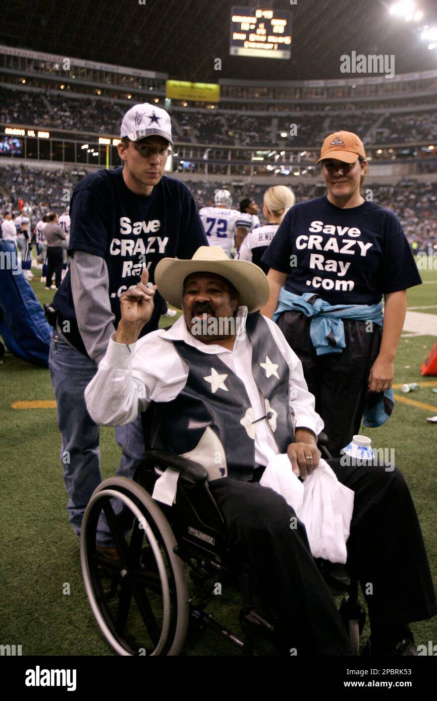 Crazy Ray Jones, the unofficial mascot of the Dallas Cowboys is pushed ...