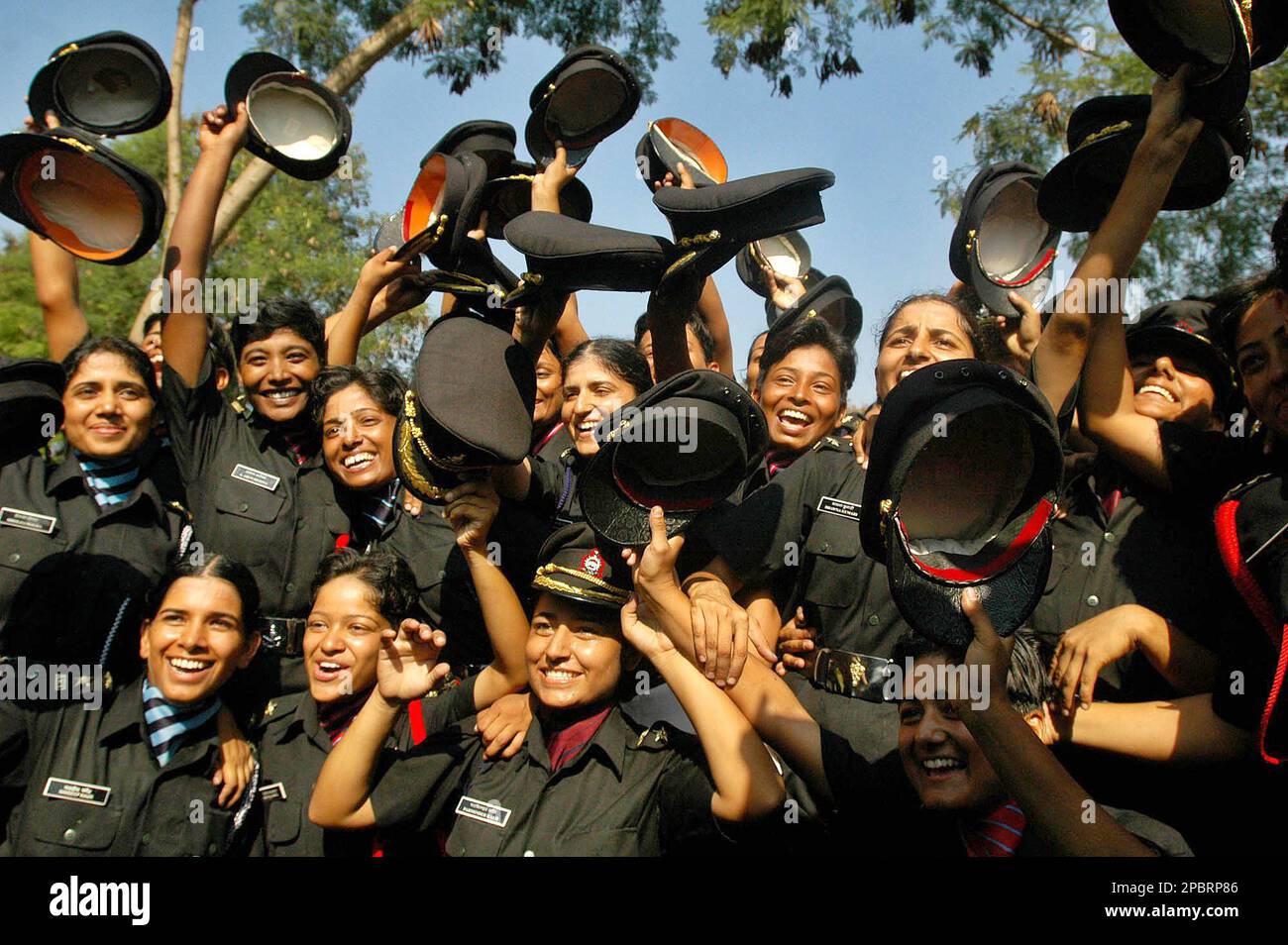 Lady Cadets cheer at the passing out parade of the Officers Training ...