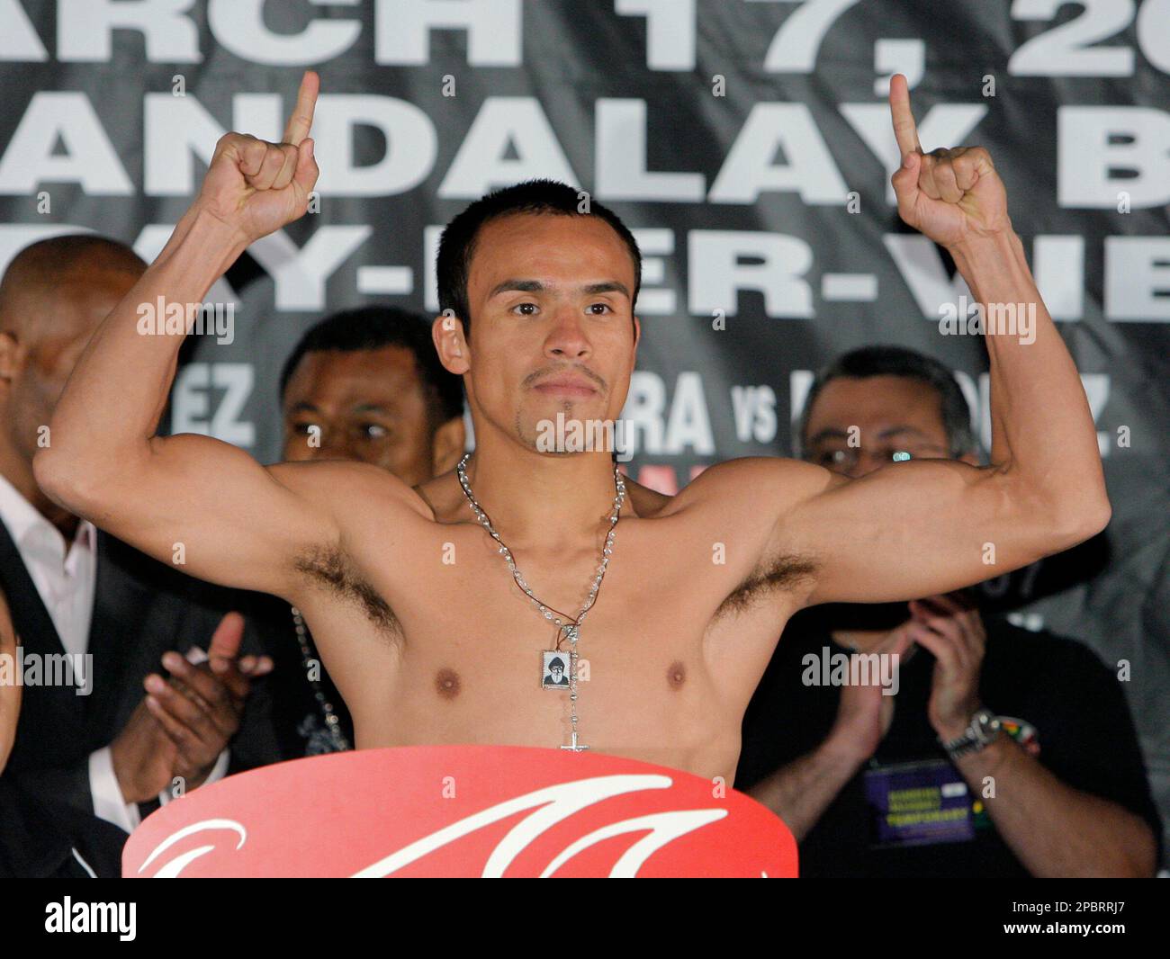 Juan Manuel Marquez, of Mexico, poses for photos during an official ...