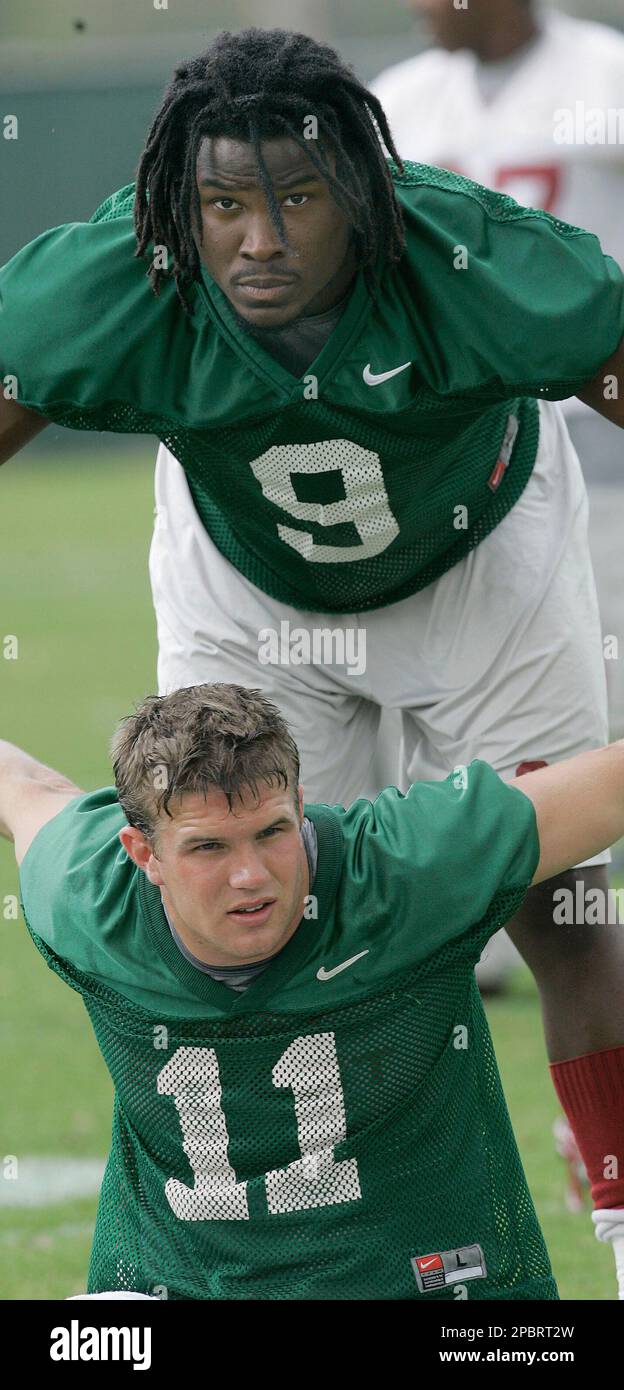 Florida State quarterbacks Xavier Lee, top, and Drew Weatherford go ...