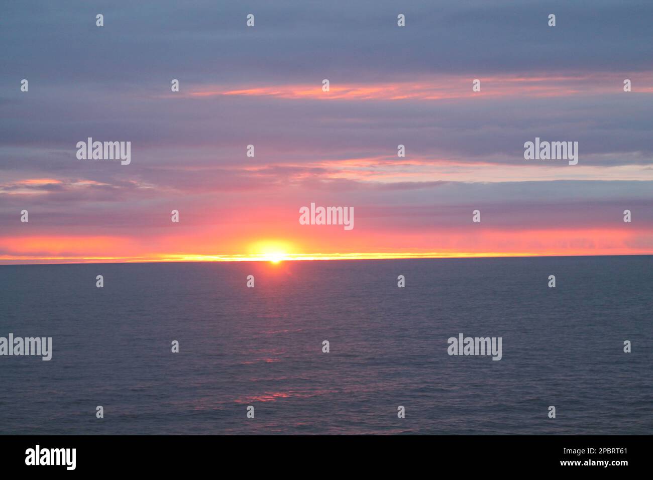 scenic sunset at the ocean in Norway seen from cruise ship Stock Photo ...