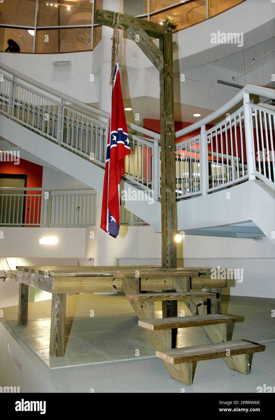 An art exhibit by artist John Sims, entitled "The Proper Way to Hang a ...