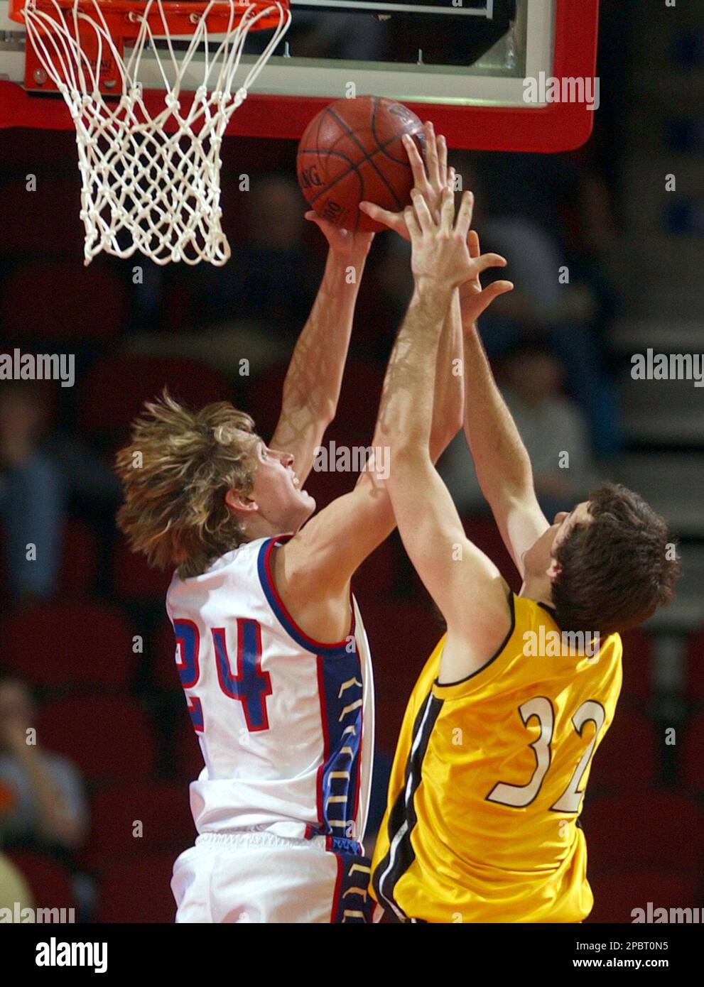 Lone Tree's Ryan Luedtke defends against Northoow-Kensett's Trevor ...