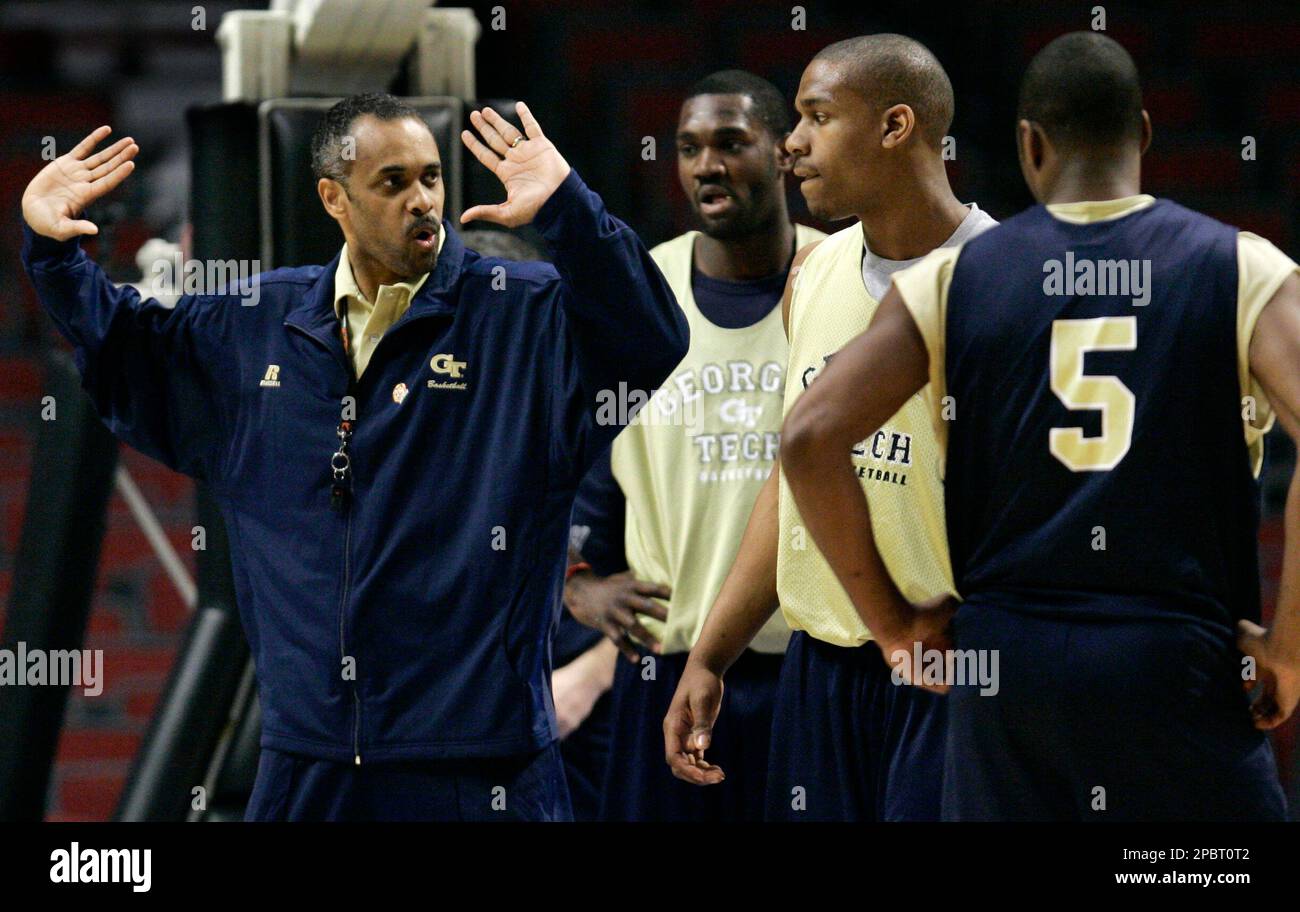 Georgia Tech coach Paul Hewitt talks to his players during their ...