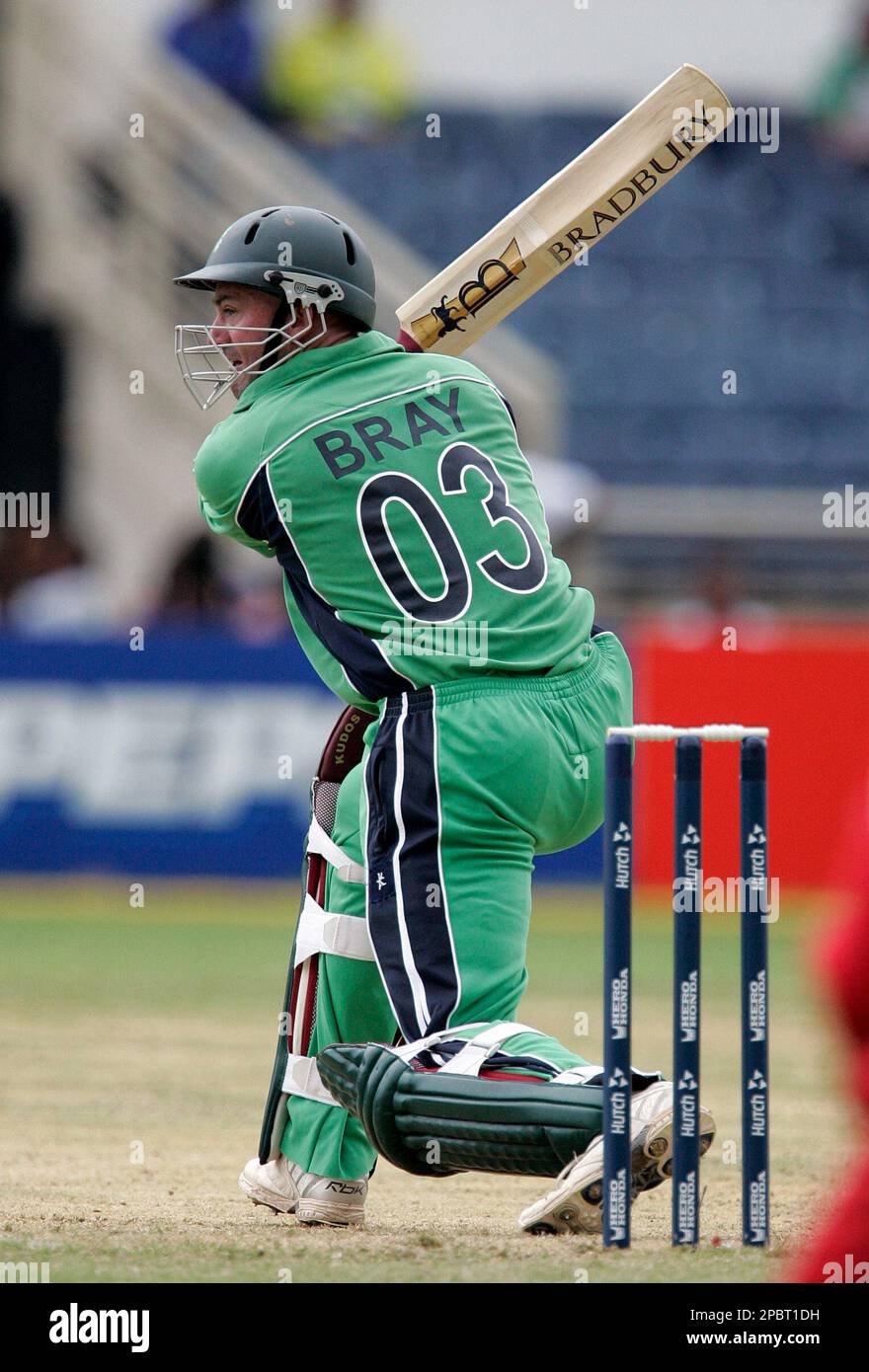 Ireland's Jeremy Bray hits a boundary shot against Zimbabwe during ...