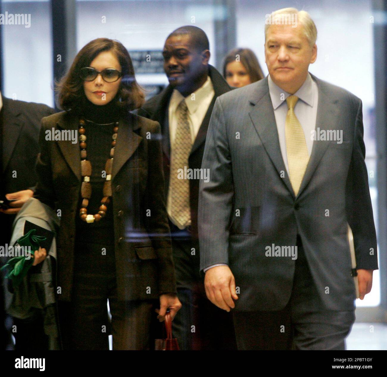 Conrad Black, right arrives at the federal court building with his wife ...